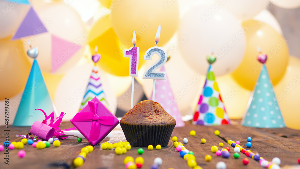 Happy birthday with a number of candles for twelve years on the ...