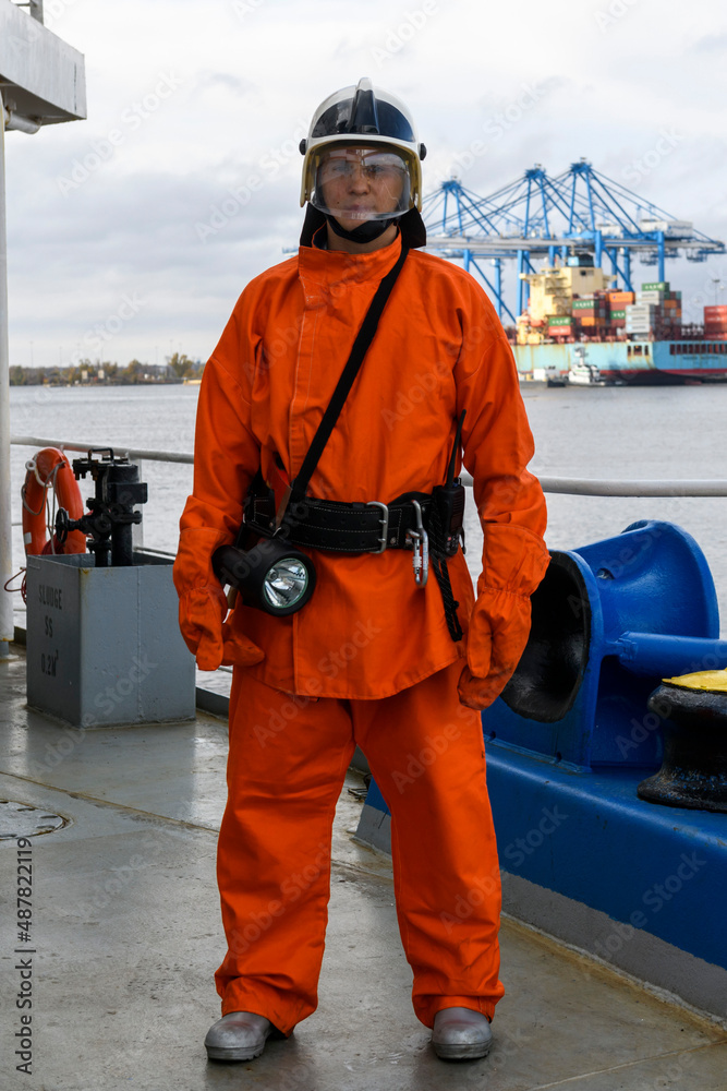 Fireman. Fire fighting equipment. Fire drill. Seaman with fire-fighter ...