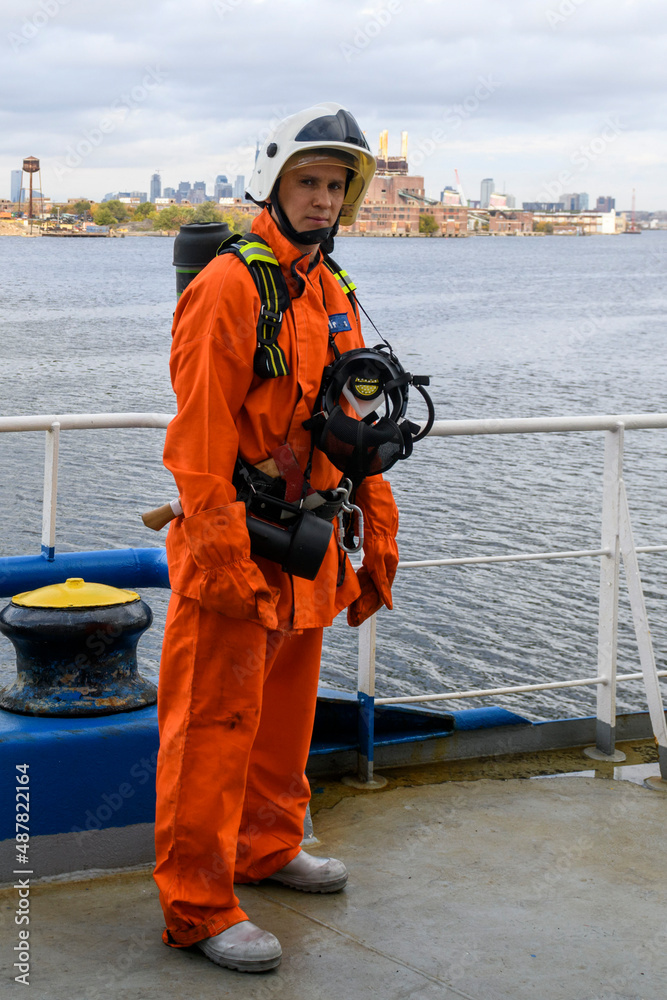 Fireman. Fire fighting equipment. Fire drill. Seaman with fire-fighter ...