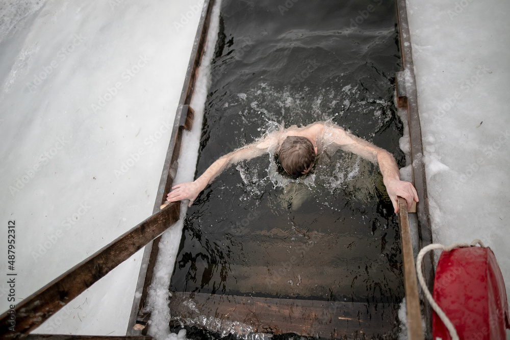 Baptism, bathing in the winter ice hole, beautiful winter landscape ...