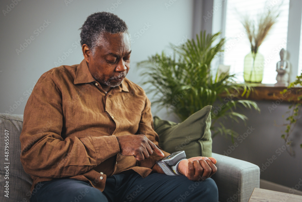 Hypertension In Older Age. Senior Black Man Measuring Arterial Blood ...