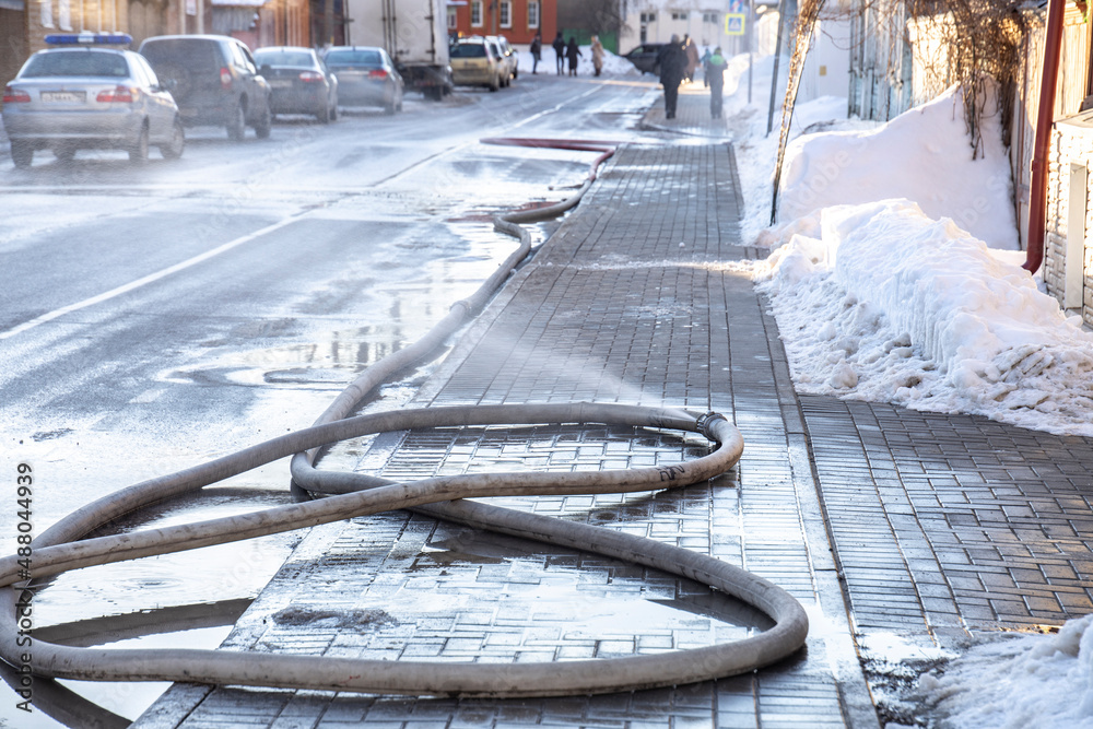 Expired Fire Hose , water leaking. water leaking from hole in a ...