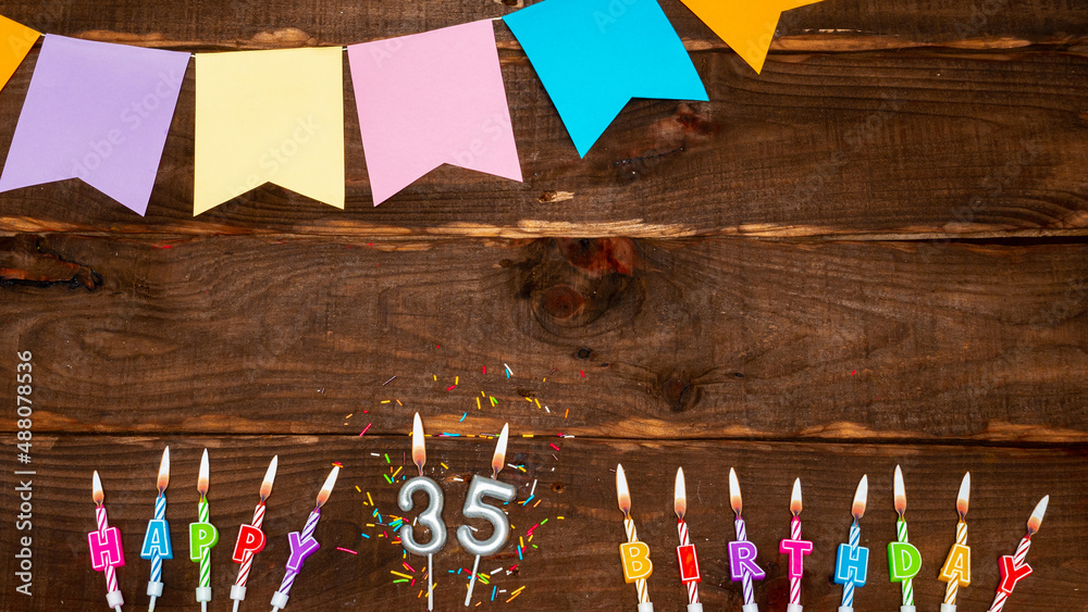 Top view, birthday decorations from letters of candles with fire and ...