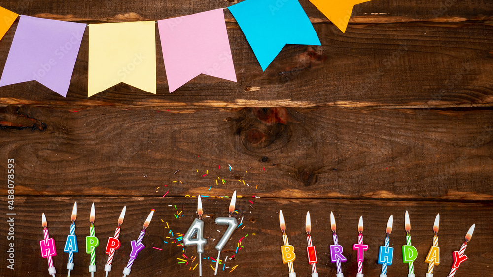 Top view, birthday decorations from letters of candles with fire and ...
