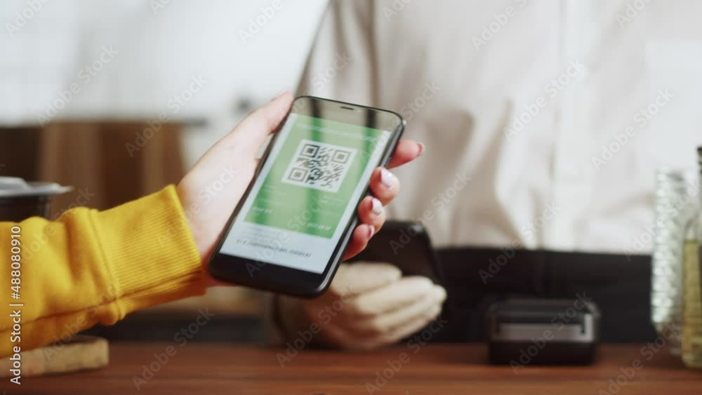 QR code, covid vaccination passport control close-up. Scanning ...