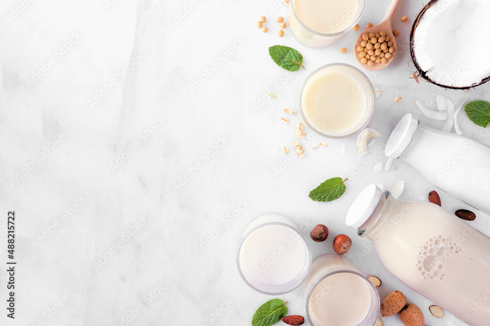 Vegan plant based non dairy milk side border. Variety of types in milk ...