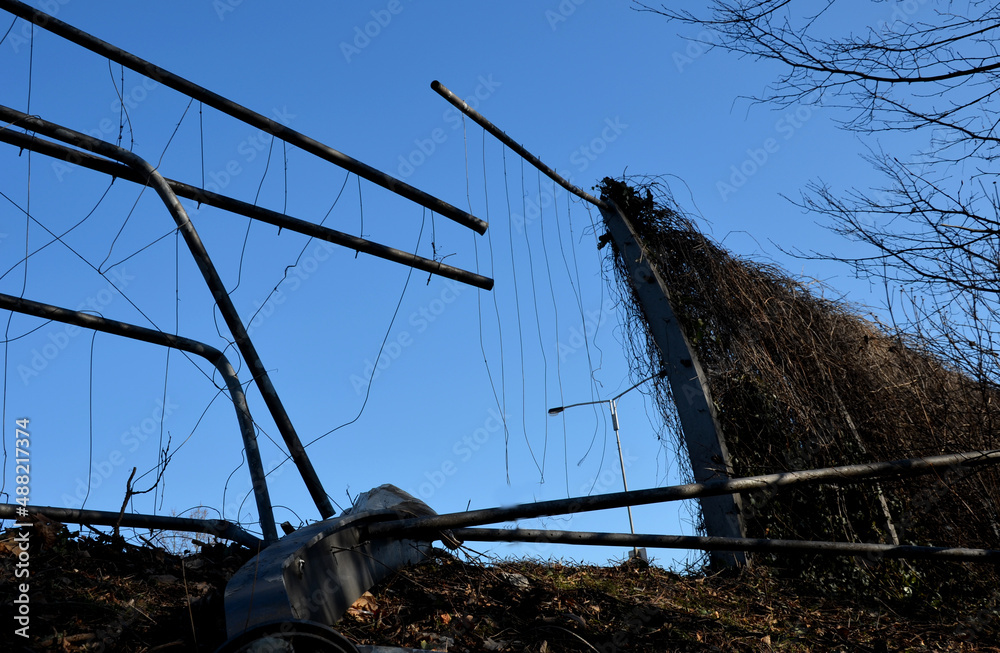 Along the road is a massive trellises for climbing plants. shields and ...