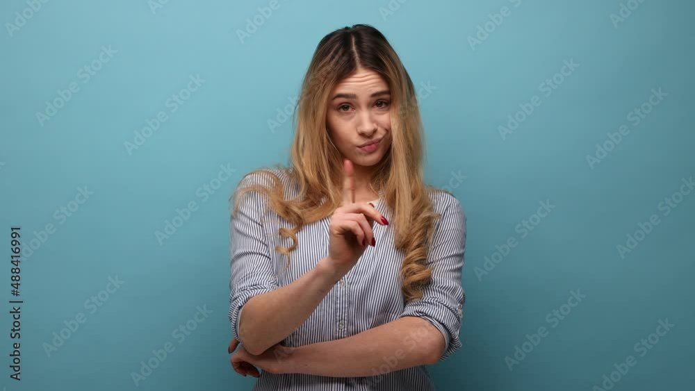 Bossy caution. Portrait of serious angry woman pointing finger, showing ...