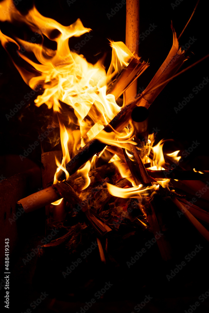 Beautiful formation of fire created by burning some dry reeds forming ...