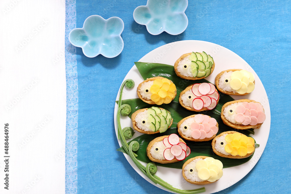 Home made Carp streamer shaped inari zushi, sushi rice inside an ...