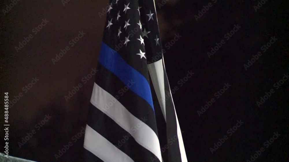 FALLEN OFFICER THIN BLUE LINE BLACK AMERICAN FLAG Stock Video | Adobe Stock