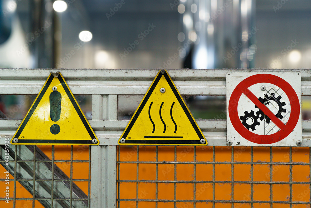 Old industrial safety sign. Warning safety sign inside a factory Stock ...