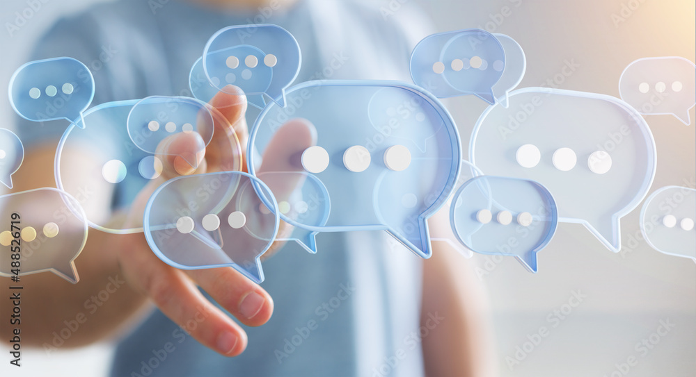 Man touching with his fingers digital speech bubbles talk icons ...