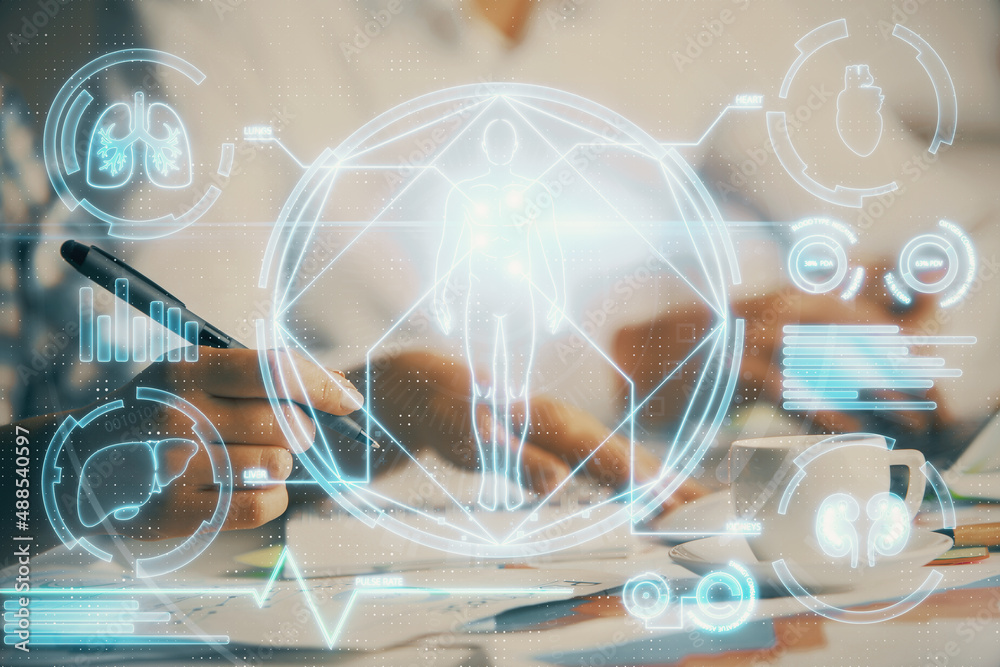 Double exposure of education theme drawing over people taking notes ...