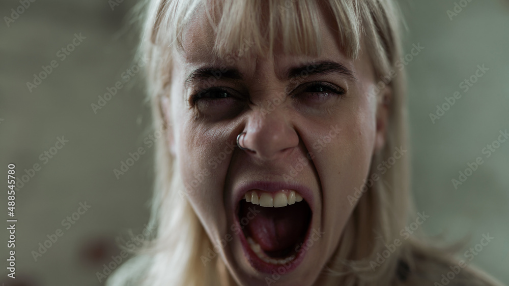 Beautiful Young Caucasian Woman Screaming Out of Anger Straight in the ...