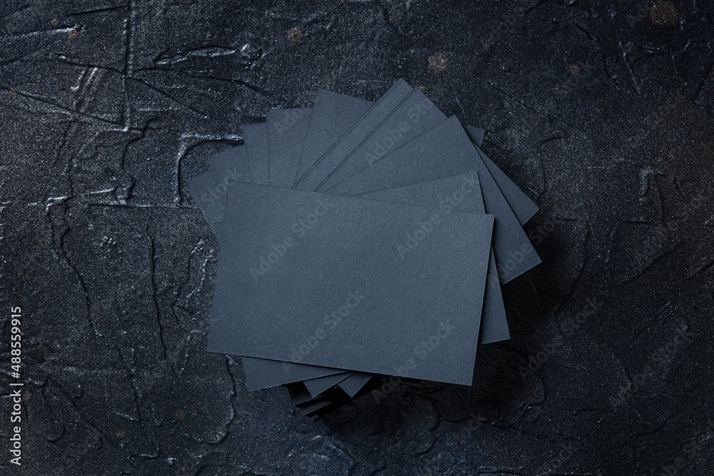 Black business card stack mockup on a dark background, a template for ...