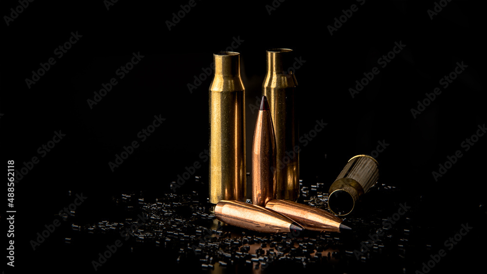 Isolate on a black background, macro photo of a bullet with a ballistic ...