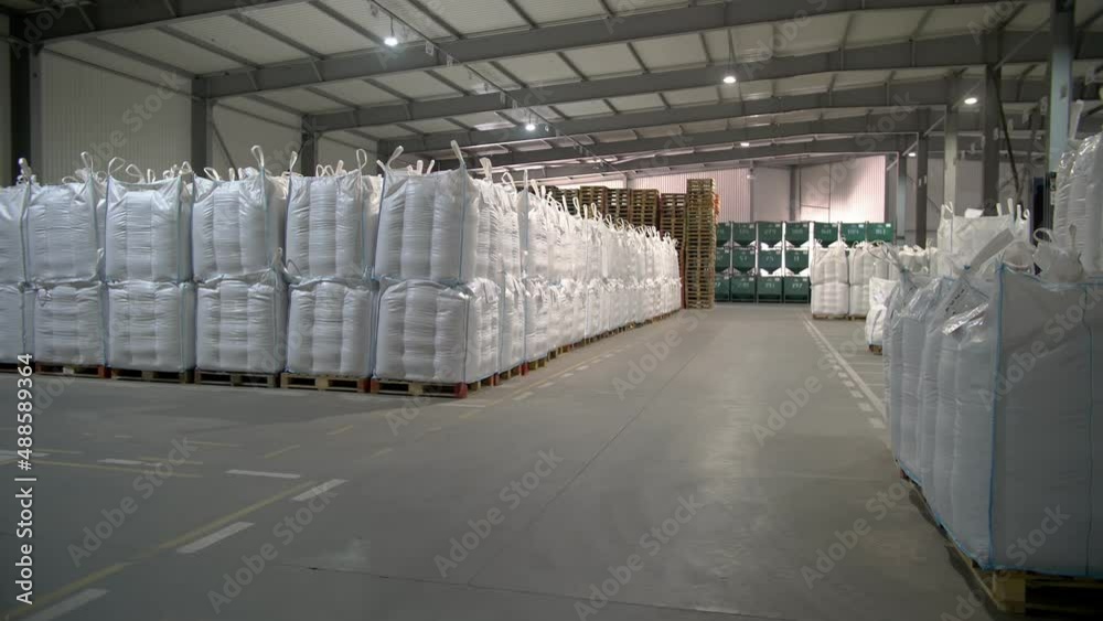 agricultural storage. warehouse. bags of corn seed, grain. large ...