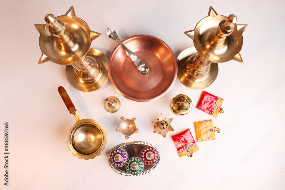 Indian traditional samai or samayee diya brass lamp on gray white ...