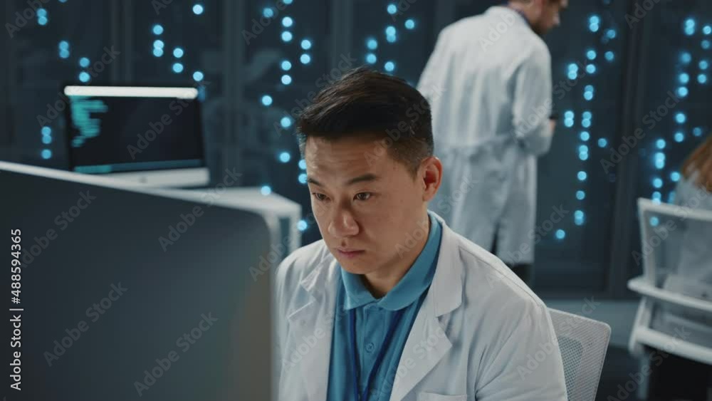 Technical support team. Data center. Multi-ethnic asian software ...