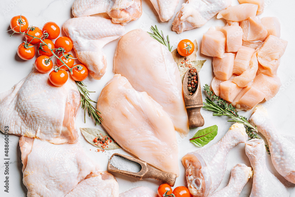 Prepared for frying, butchered various portions of raw chicken meat ...