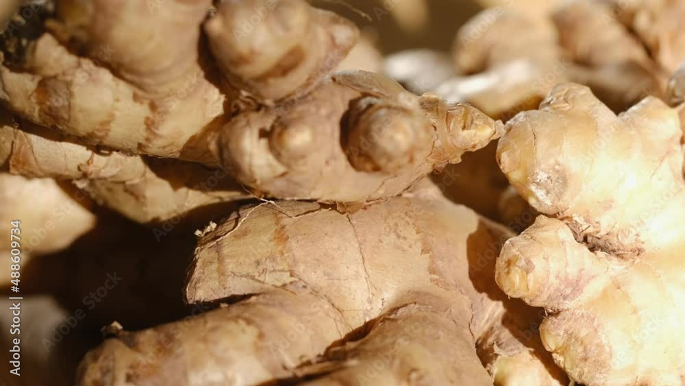 Whole ginger root on close up rotating.a composition based on ginger ...