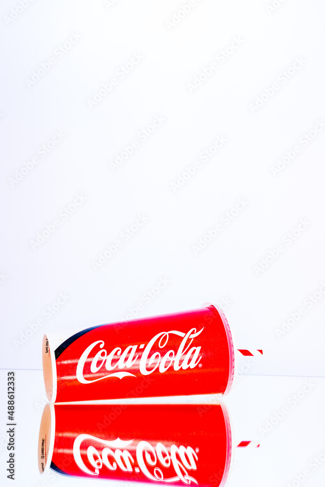 Coca Cola paper cup. Illustrative editorial photo in studio in ...