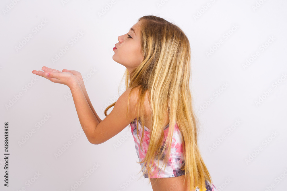 Profile side view view portrait of attractive little caucasian kid girl ...