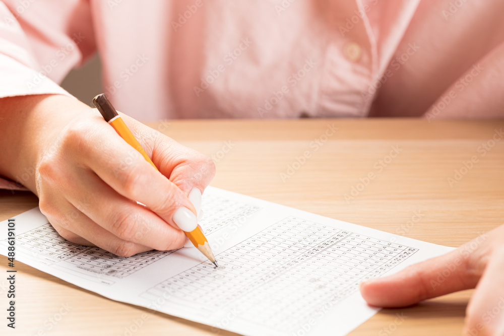 student hand testing in exercise and passing exam carbon paper computer ...