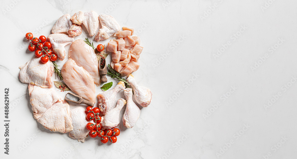 Prepared for frying, butchered various portions of raw chicken meat ...