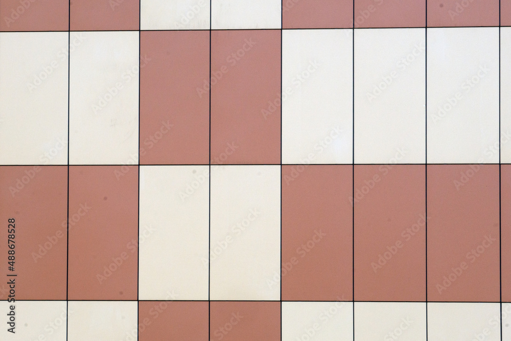 Tile pattern installed on the exterior wall of a building Stock Photo ...