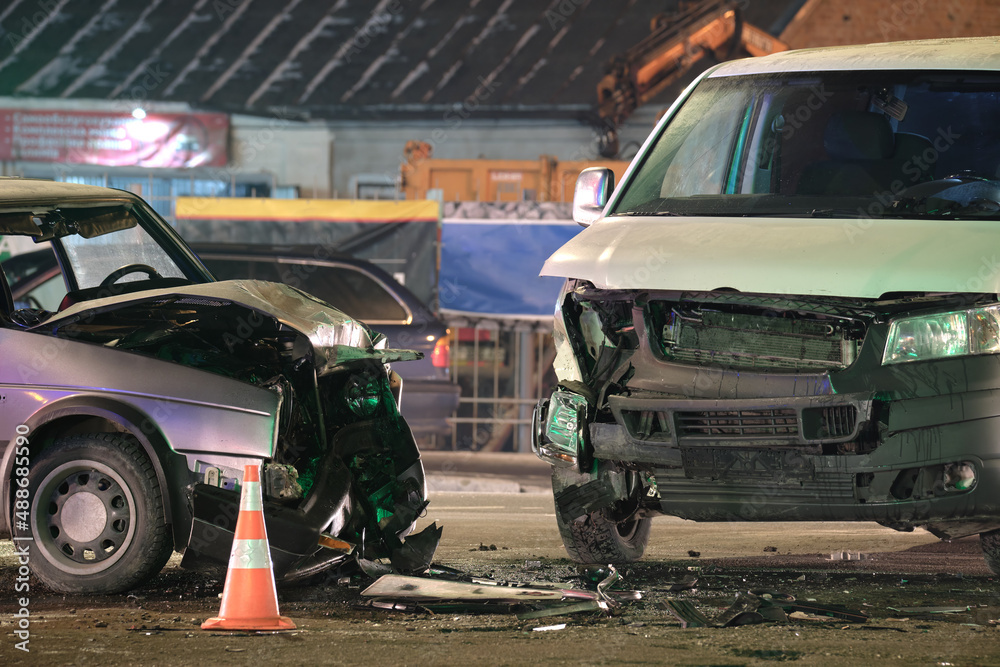 Cars crashed heavily in road accident after collision on city street at ...