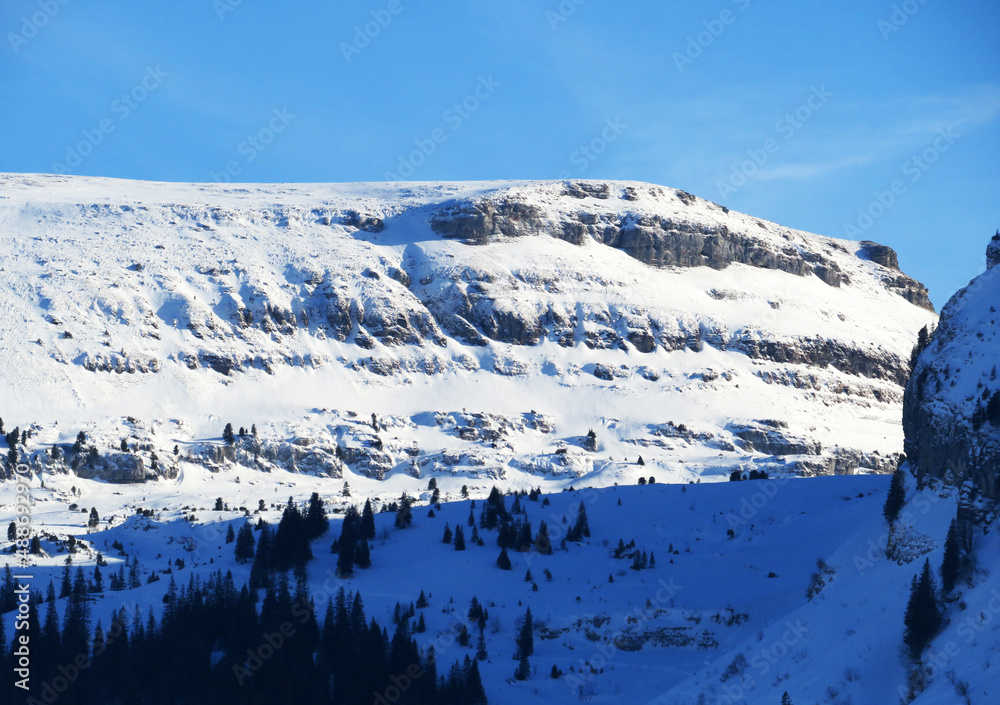 Snow-capped alpine peak Gamserrugg (or Gamser Rugg 2075 m) in the ...