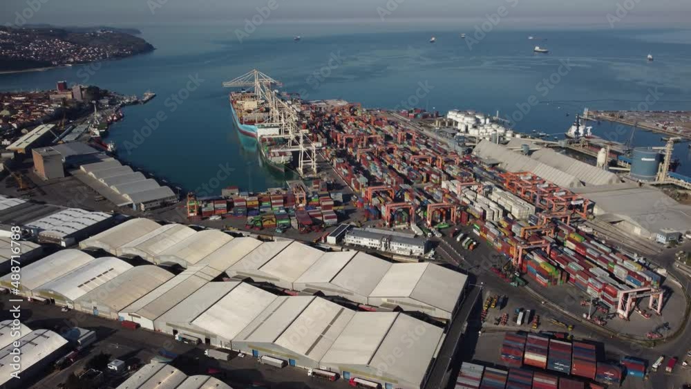 Container ship loading and unloading in deep sea port, Aerial view of ...