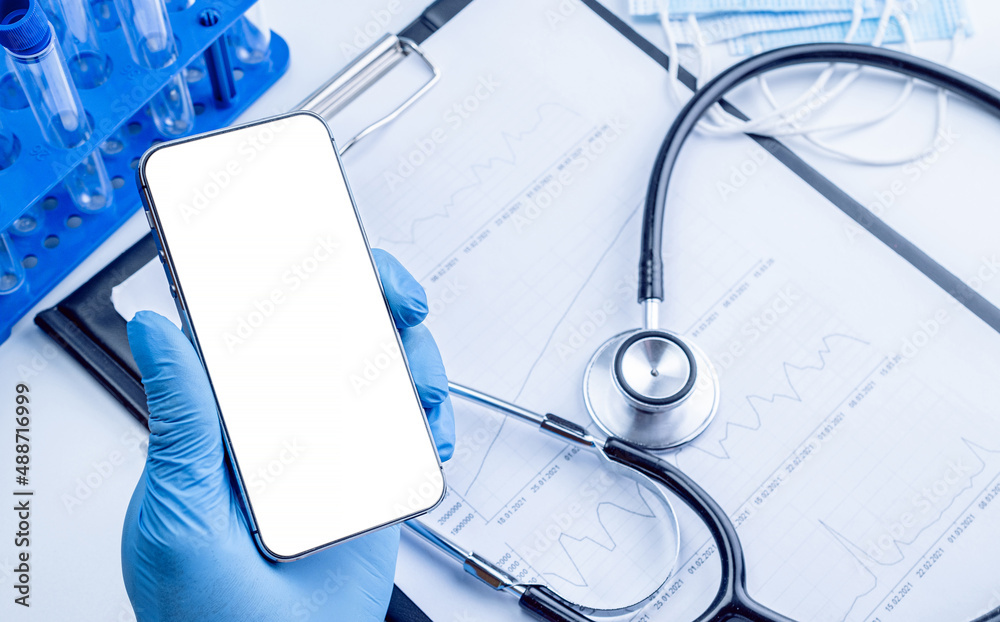 Cellphone mockup. Syringe with needle, hospital healthcare charts ...