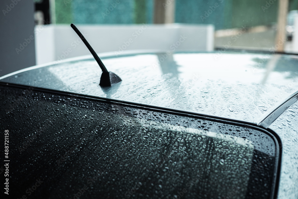 Water droplets on car windshield. Heavy rain fell on the roof of the ...
