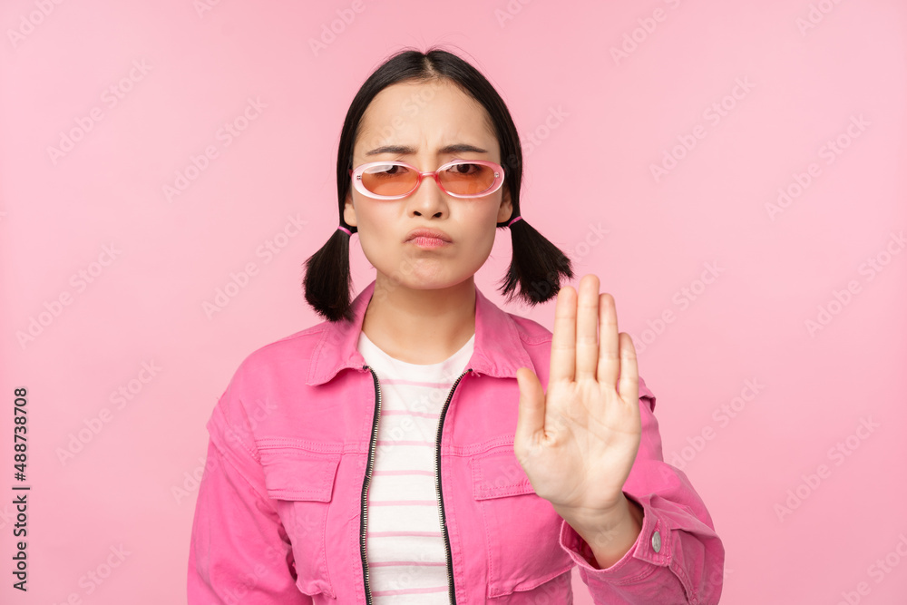 Image Of Serious Stylish Asian Girl In Sunglasses Showing Stop Prohibit Gesture Taboo Sign