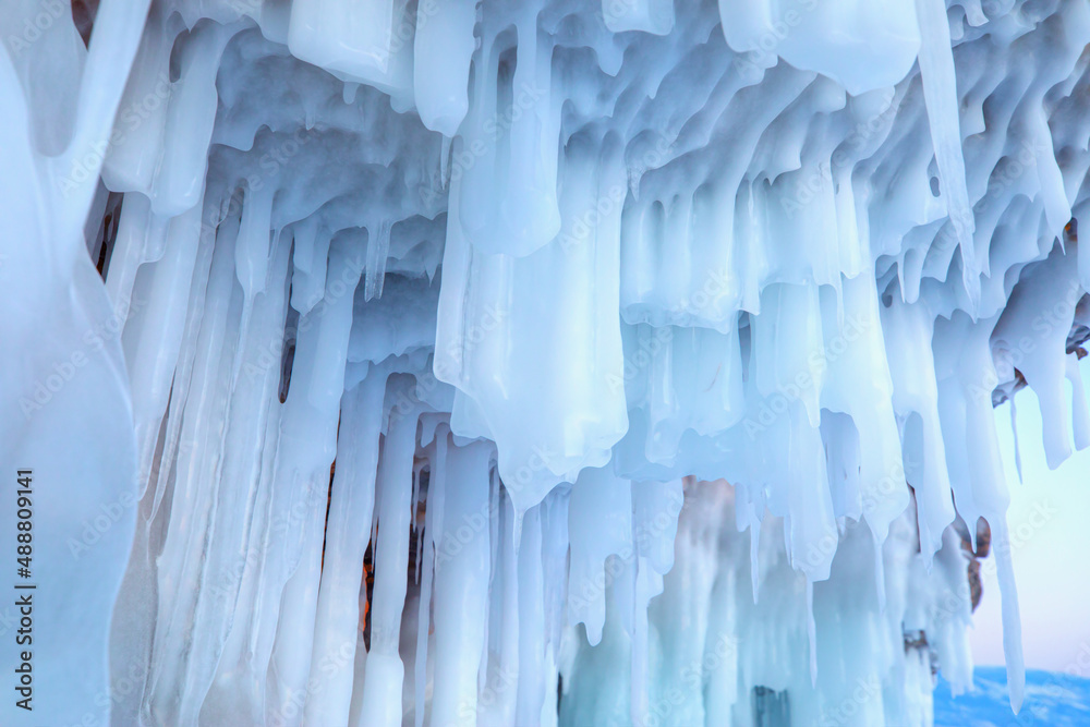 Ice and snow patterns and icicles on rocks in the cave - The rock on ...