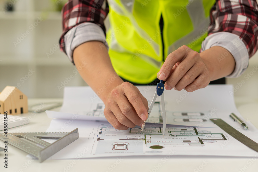 Engineers are designing houses for architectural projects. engineering ...