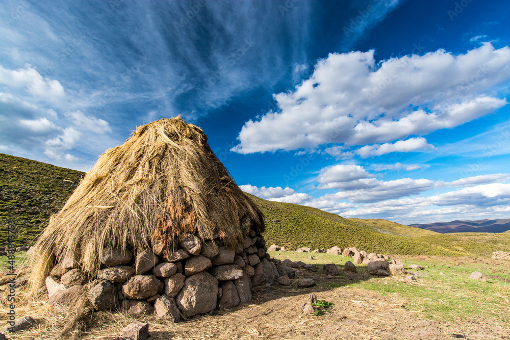 Travel to Lesotho. A rondavel, the traditional hut of Basotho shepherds ...