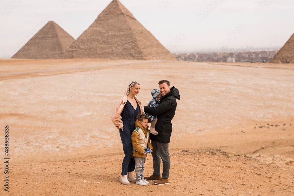happy tourist family in Giza. holiday travel tpur near Pyramid of ...