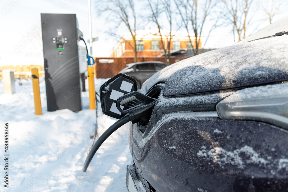 vehicle, power and green energy concept - close up of electric car ...