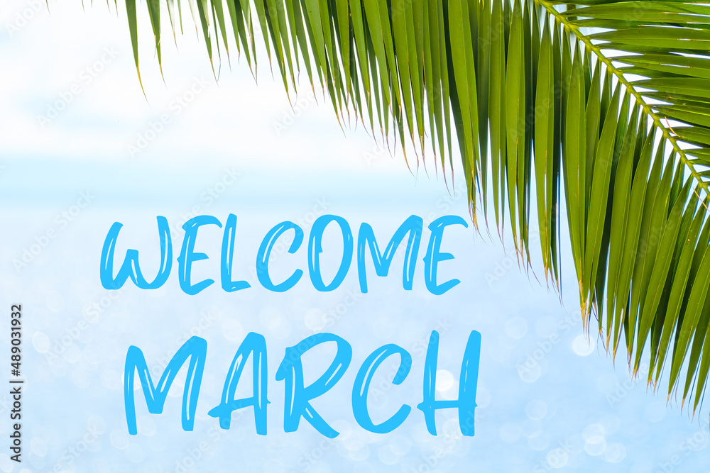 Welcome March text on the background with palm leaf and blue sea ...