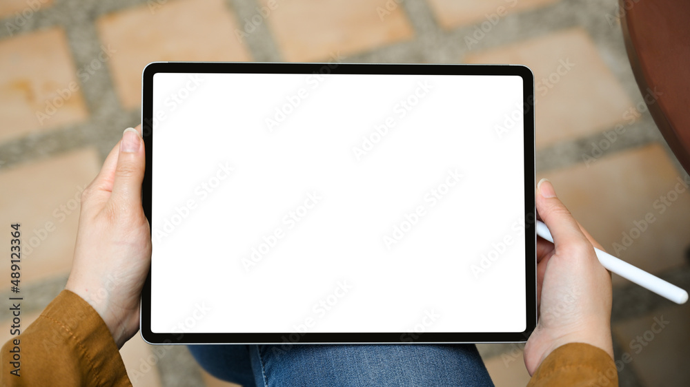 Tablet touchpad white screen mockup in a women's hands. Stock Photo ...