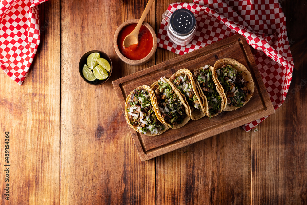 Tacos de Suadero. Fried meat in a corn tortilla. Street food from CDMX ...