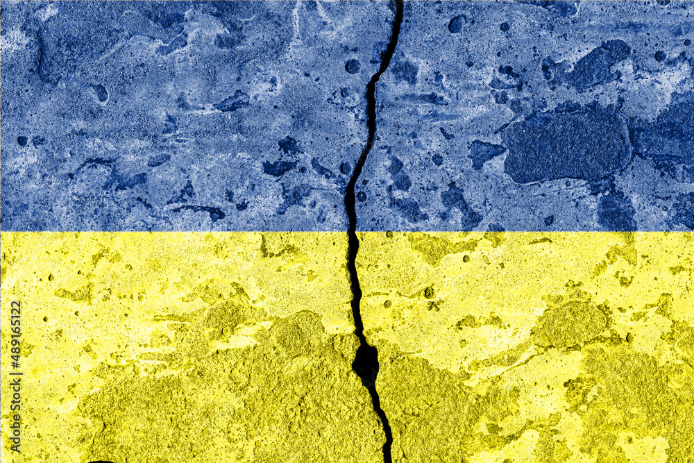 Ukrainian flag on cracked concrete wall. The concept of crisis, default ...
