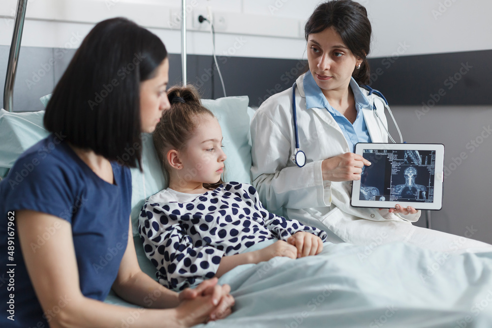 Healthcare pediatric clinic radiology expert talking about x-ray scan ...