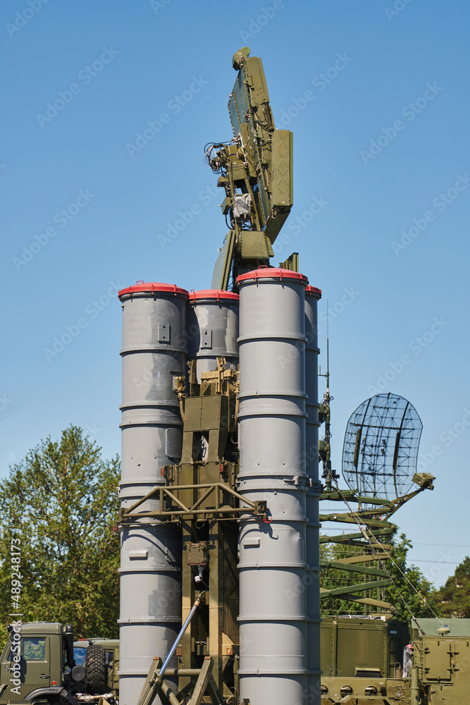 military vehicles in combat readiness with a deployed anti-aircraft ...