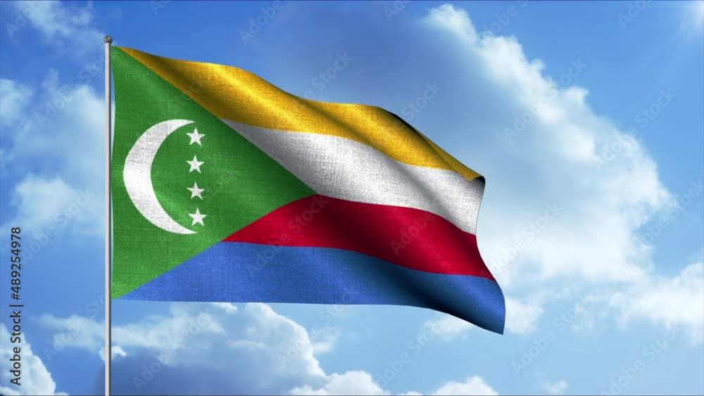 Comoros flag. Motion. A multi-colored flag with a green triangle on the ...