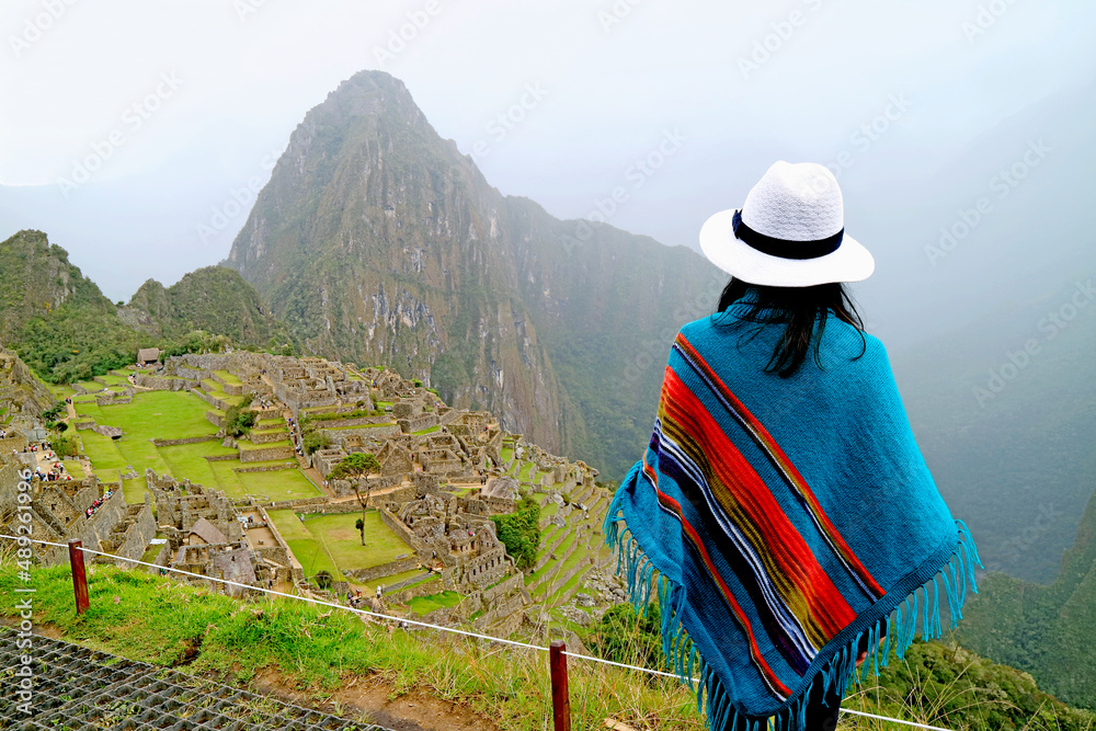 Woman in Blue Poncho Being Impressed by the Amazing Ancient Inca ...
